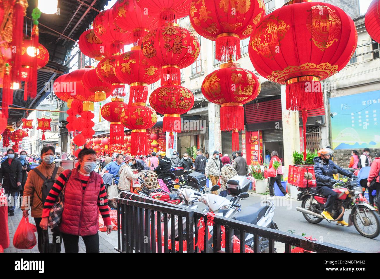 Chinese people choose New Year goods at the Shuijie Street Market for ...
