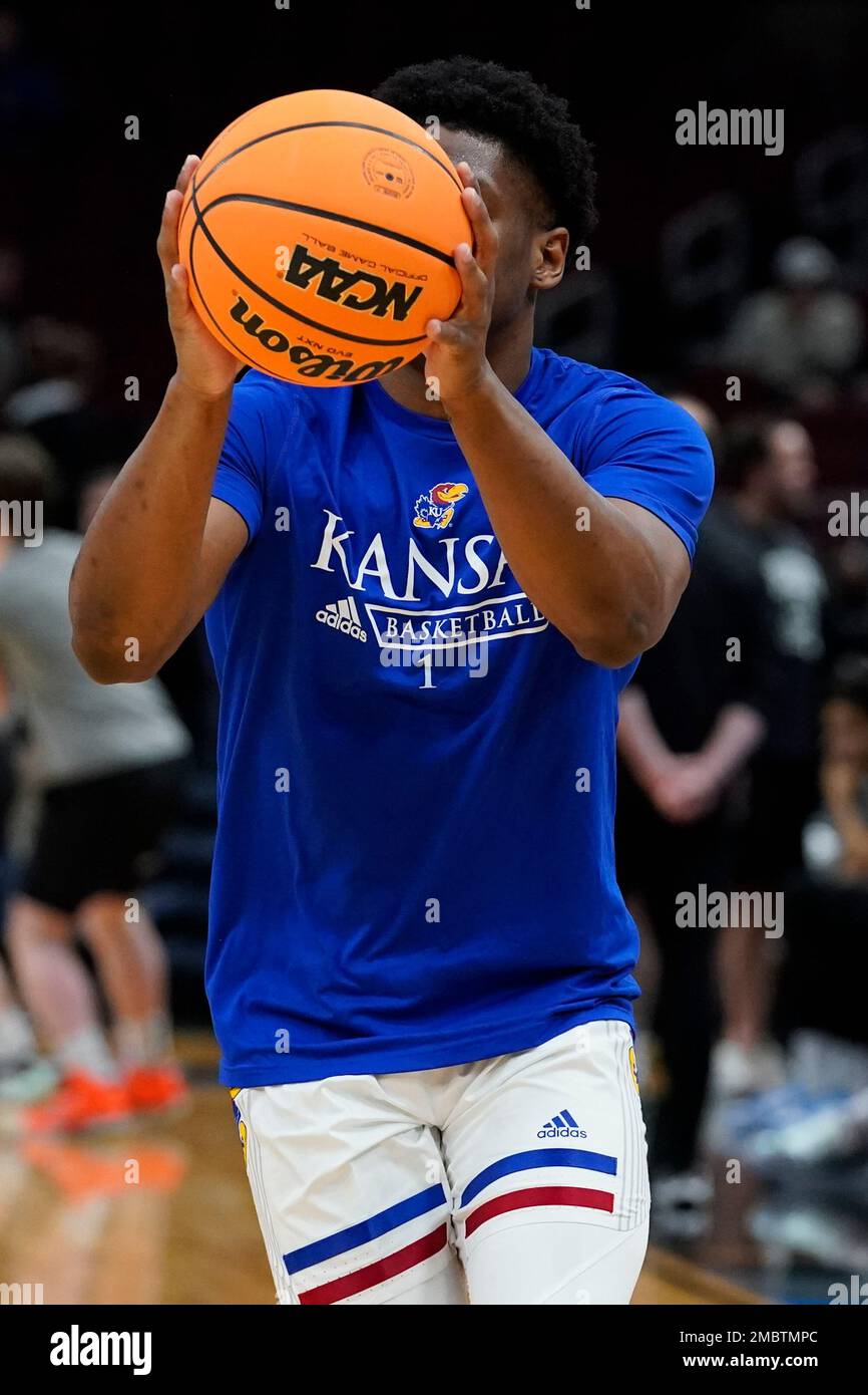 Kansas's Joseph Yesufu warms up before a college basketball game in the ...