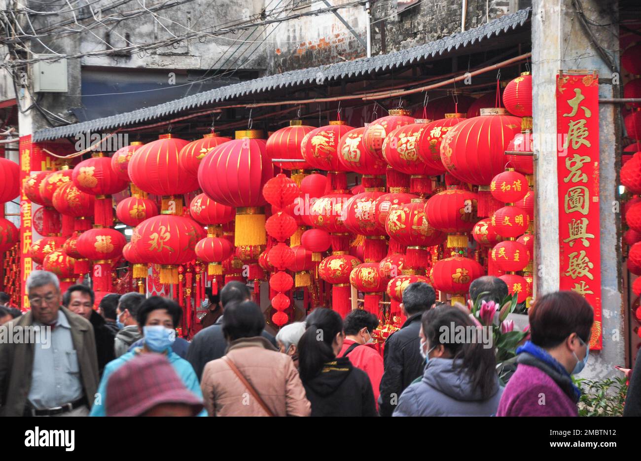 Chinese people choose New Year goods at the Shuijie Street Market for ...