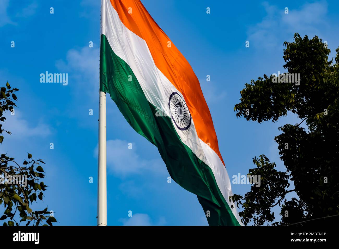 India flag flying high at Connaught Place with pride in blue sky, India ...