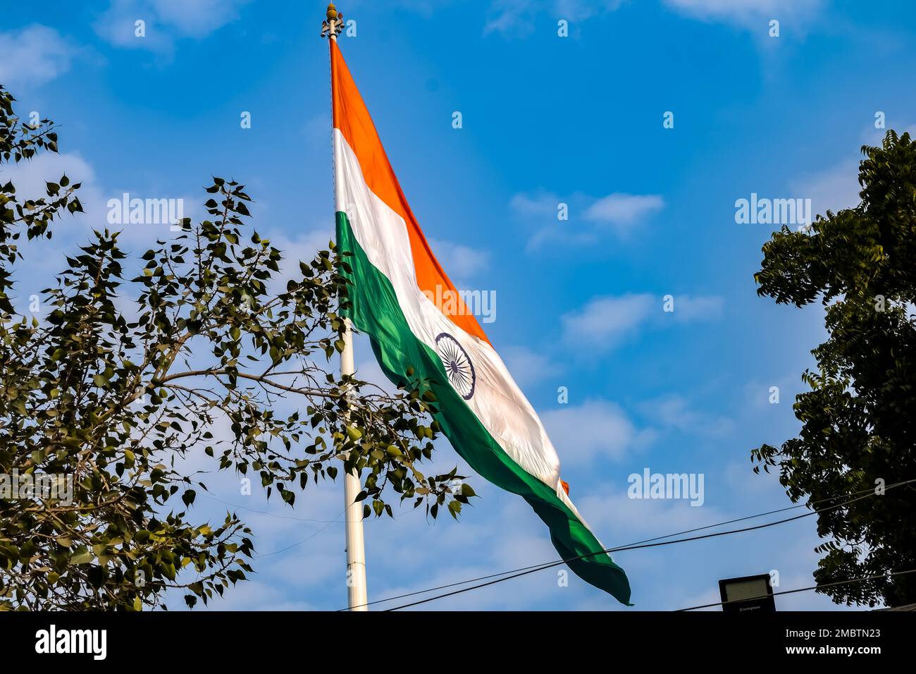 India flag flying high at Connaught Place with pride in blue sky, India ...