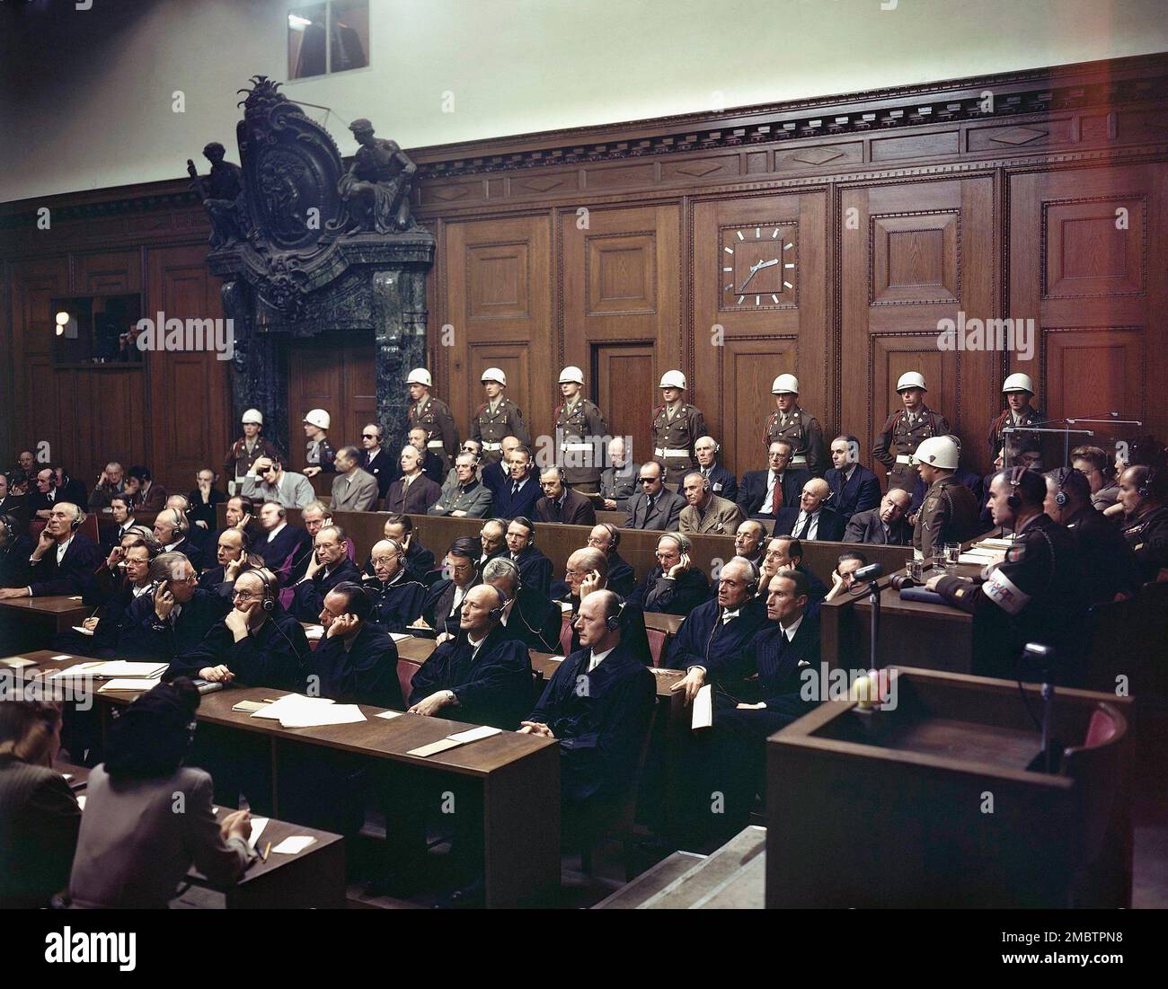 FILE - Defendants listen to part of the verdict in the Palace of ...