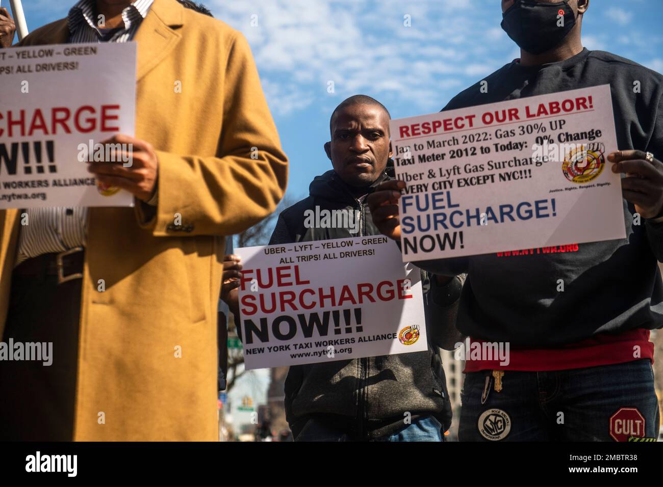 Taxi drivers hold a rally calling for surcharges on fuel at the Shell ...