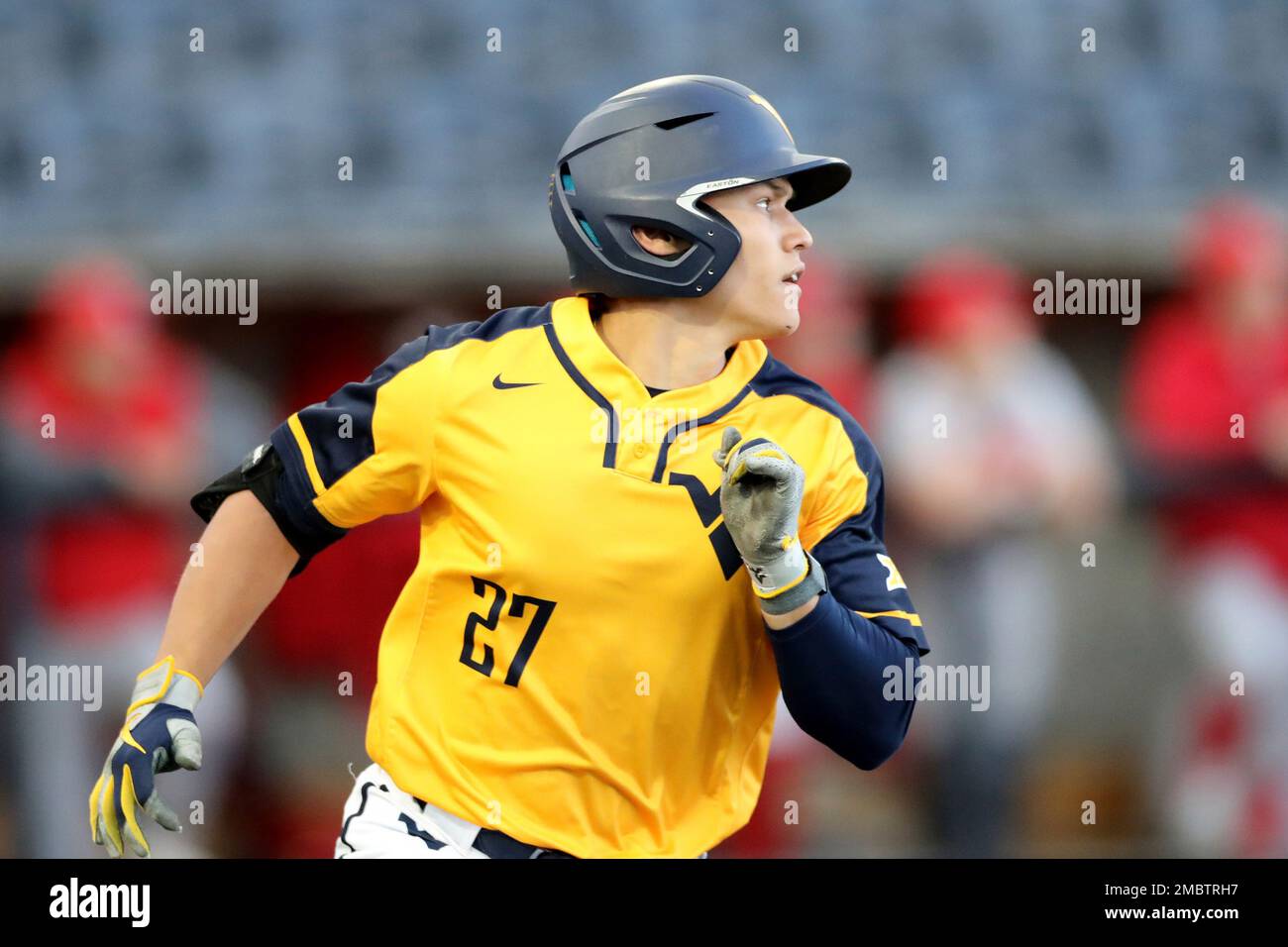 West Virginia's JJ Wetherholt #27 watches a home run against Youngstown ...