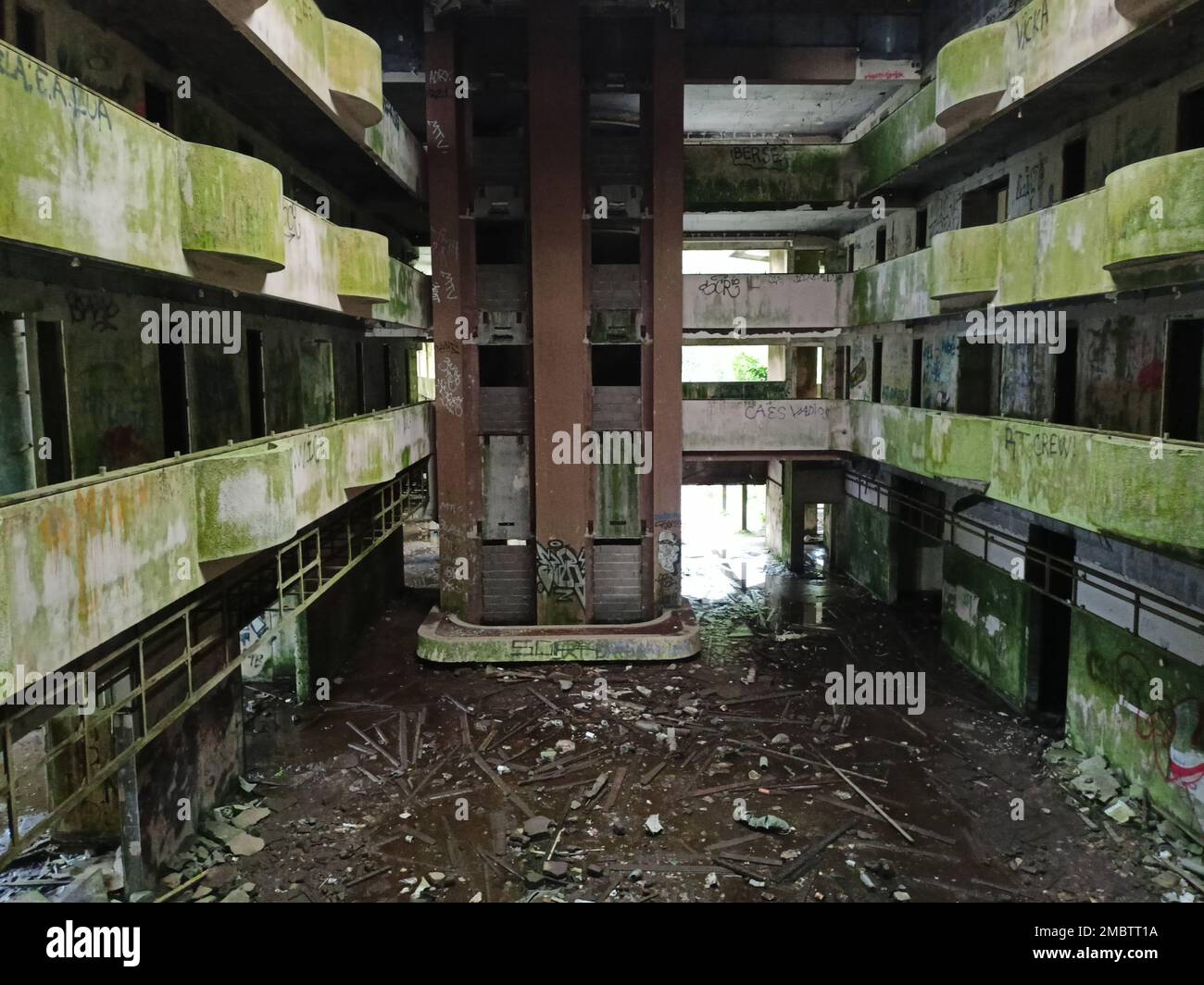 The interior of an abandoned hotel building in the Azores in ruins and ...