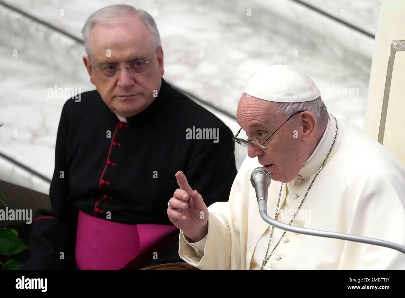 Pope Francis, flanked at left, by Monsignor Leonardo Sapienza, delivers ...