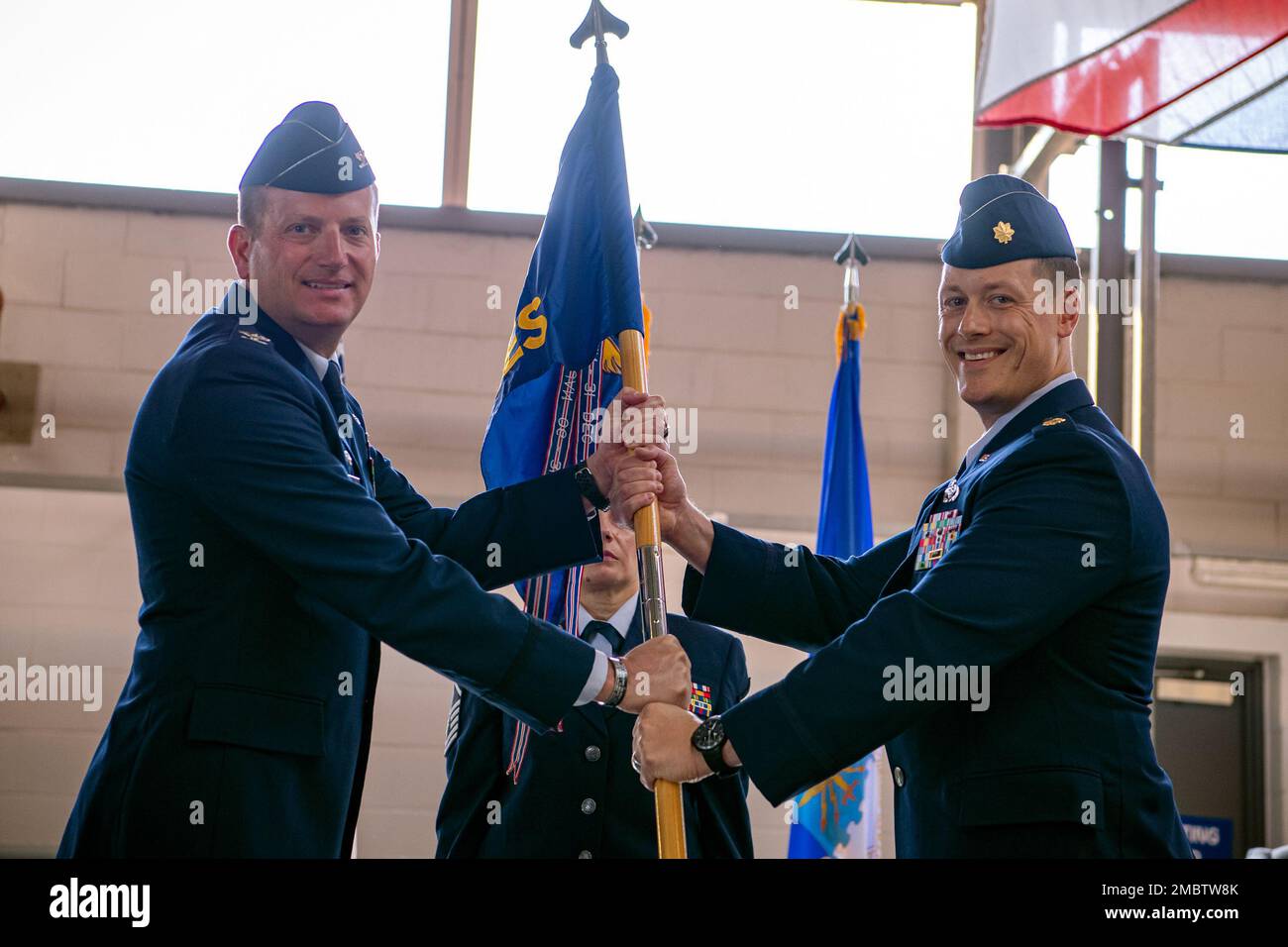 U.S. Air Force Maj. Kevin Mckinley, right, 423d Civil Engineer Squadron incoming commander ...