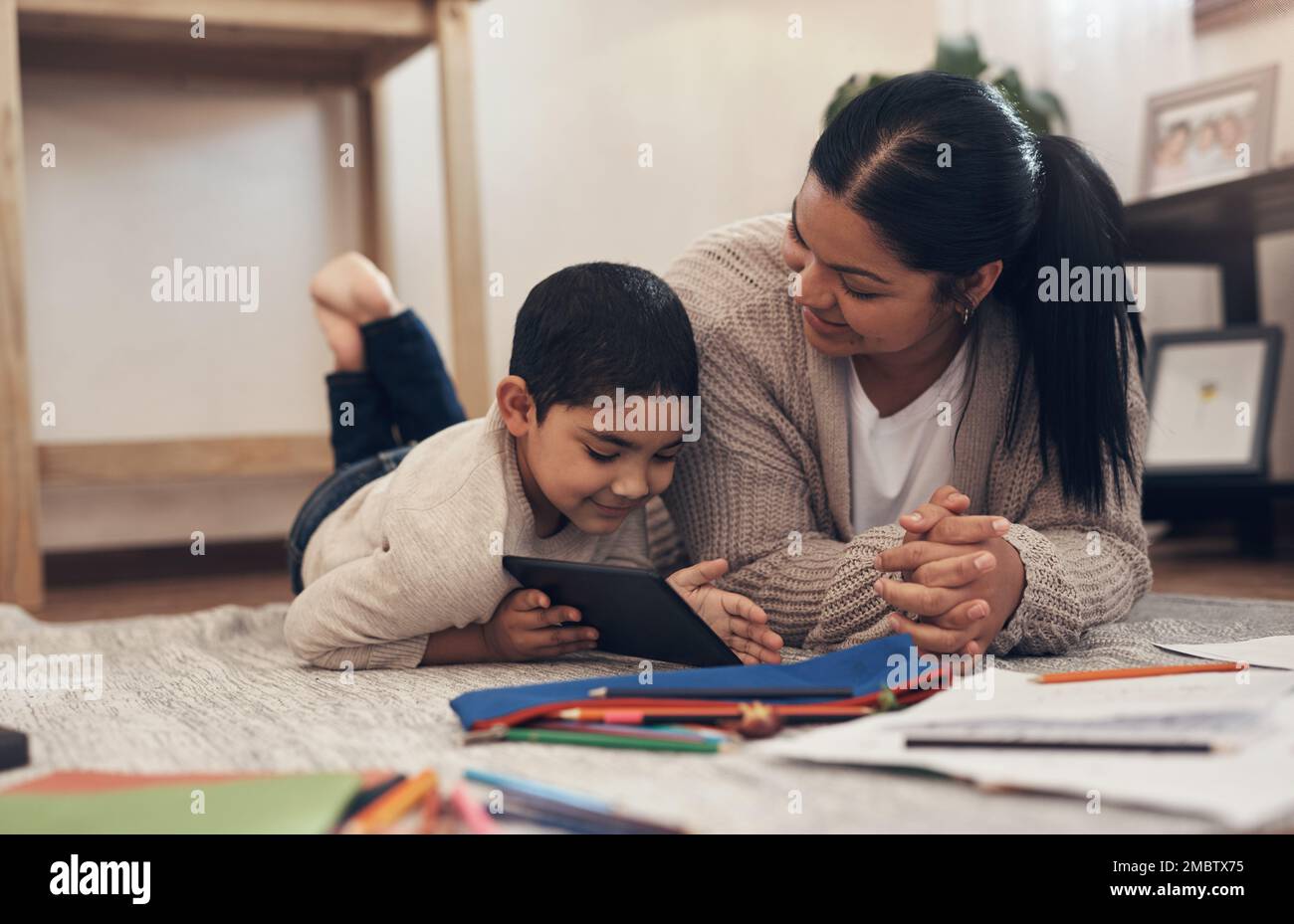 The smarter the app, the easier the math. an adorable little boy using ...