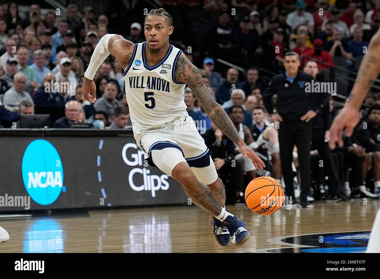Villanova guard Justin Moore brings the ball down court against ...