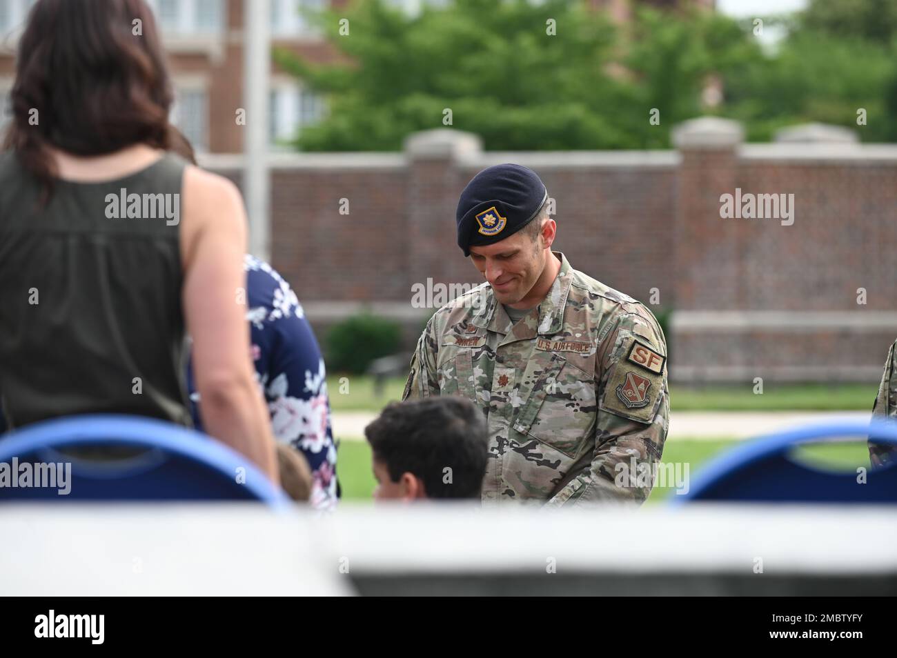 U.S. Air Force Maj. Nathan Aiken, 11th Security Forces Squadron outgoing commander, smiles ...