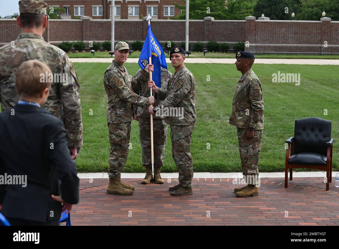 U.S. Air Force Maj. Nathan Aiken, right, 11th Security Forces Squadron ...