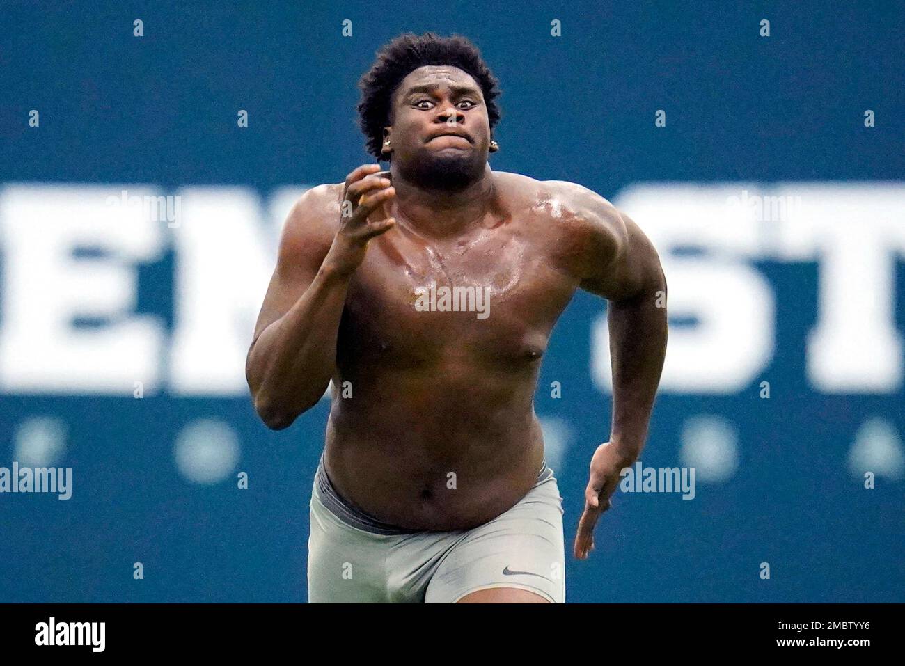 Penn State defensive tackle Derrick Tangelo runs a football drill ...