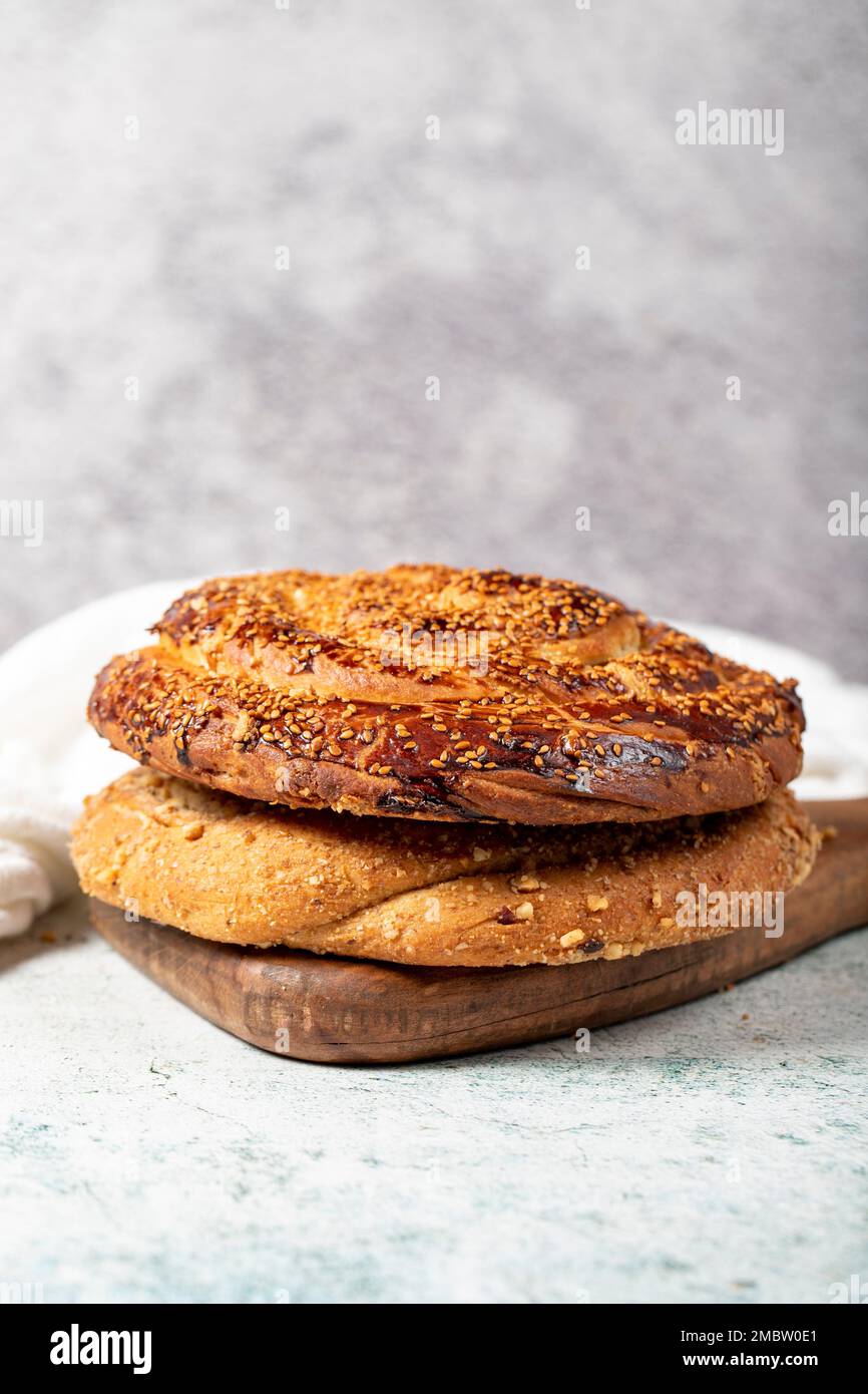 Poppy bread. Bread prepared with poppy on stone background. close up ...