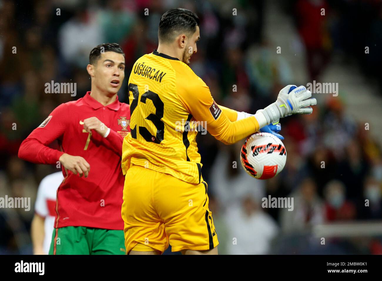 Turkey goalkeeper Ugurcan Cakir makes a save in front of Portugal's ...