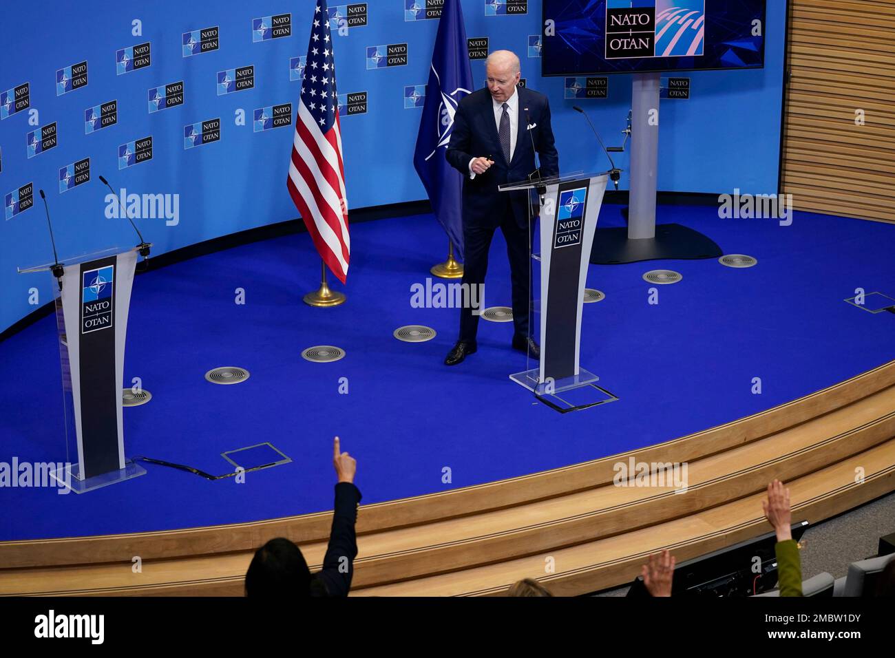 President Joe Biden departs a news conference after a NATO summit and ...