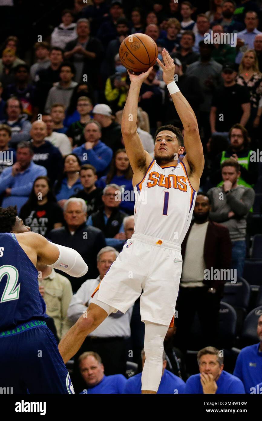 Phoenix Suns guard Devin Booker shoots during an NBA basketball game ...