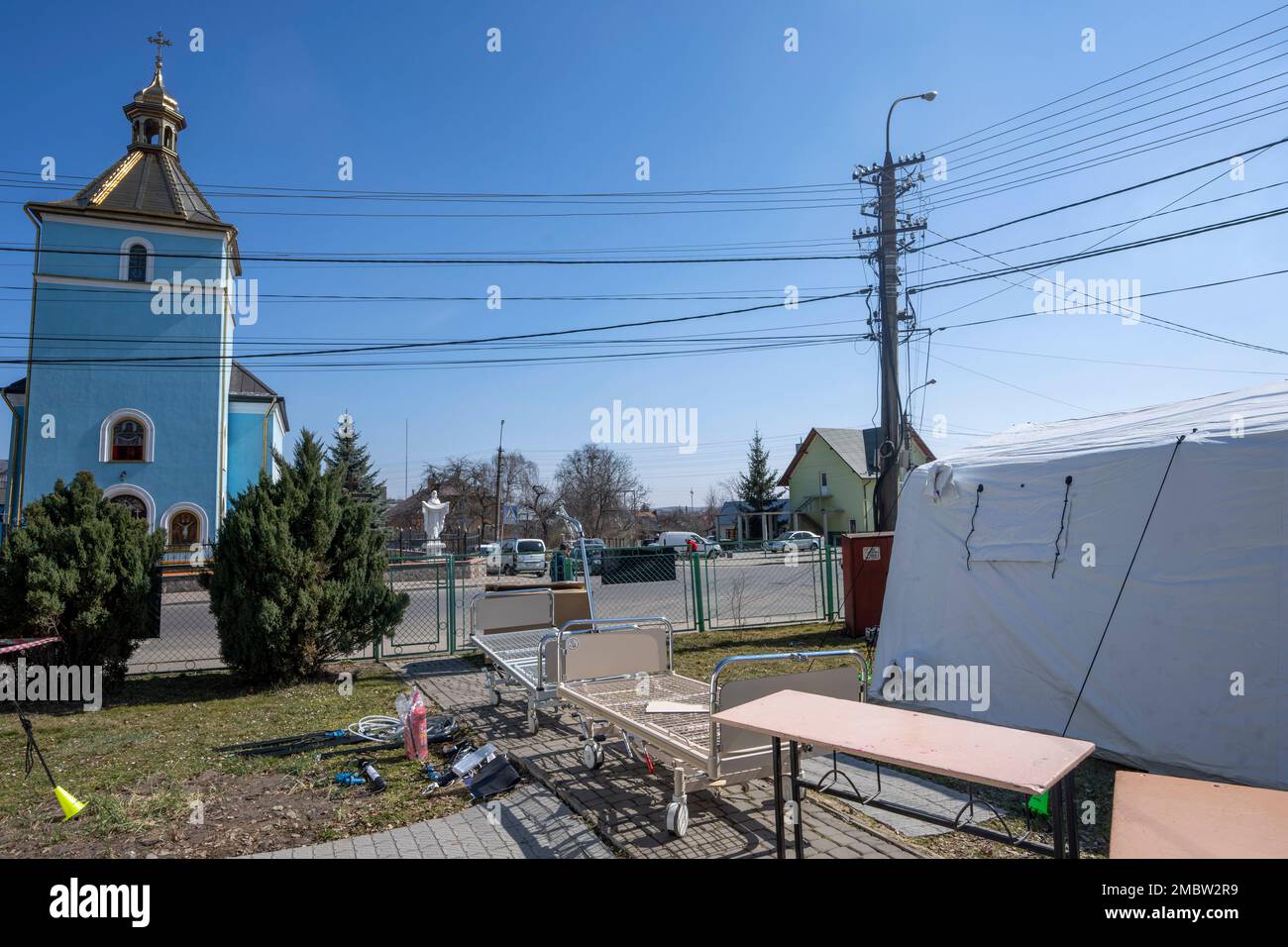 The schoolhouse that has been converted into a field hospital stands in ...