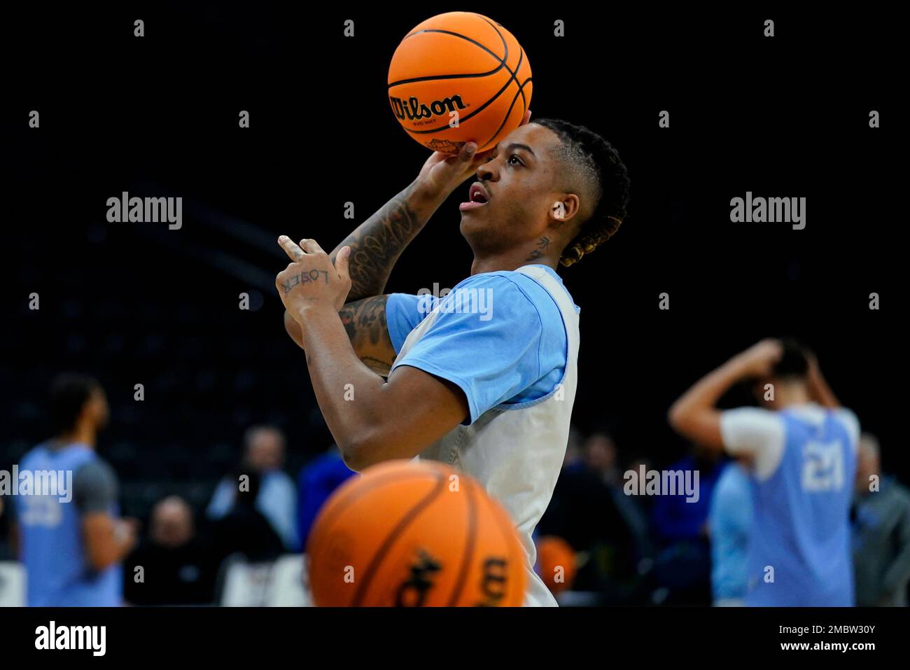 North Carolina's Armando Bacot warms up during practice for the NCAA ...