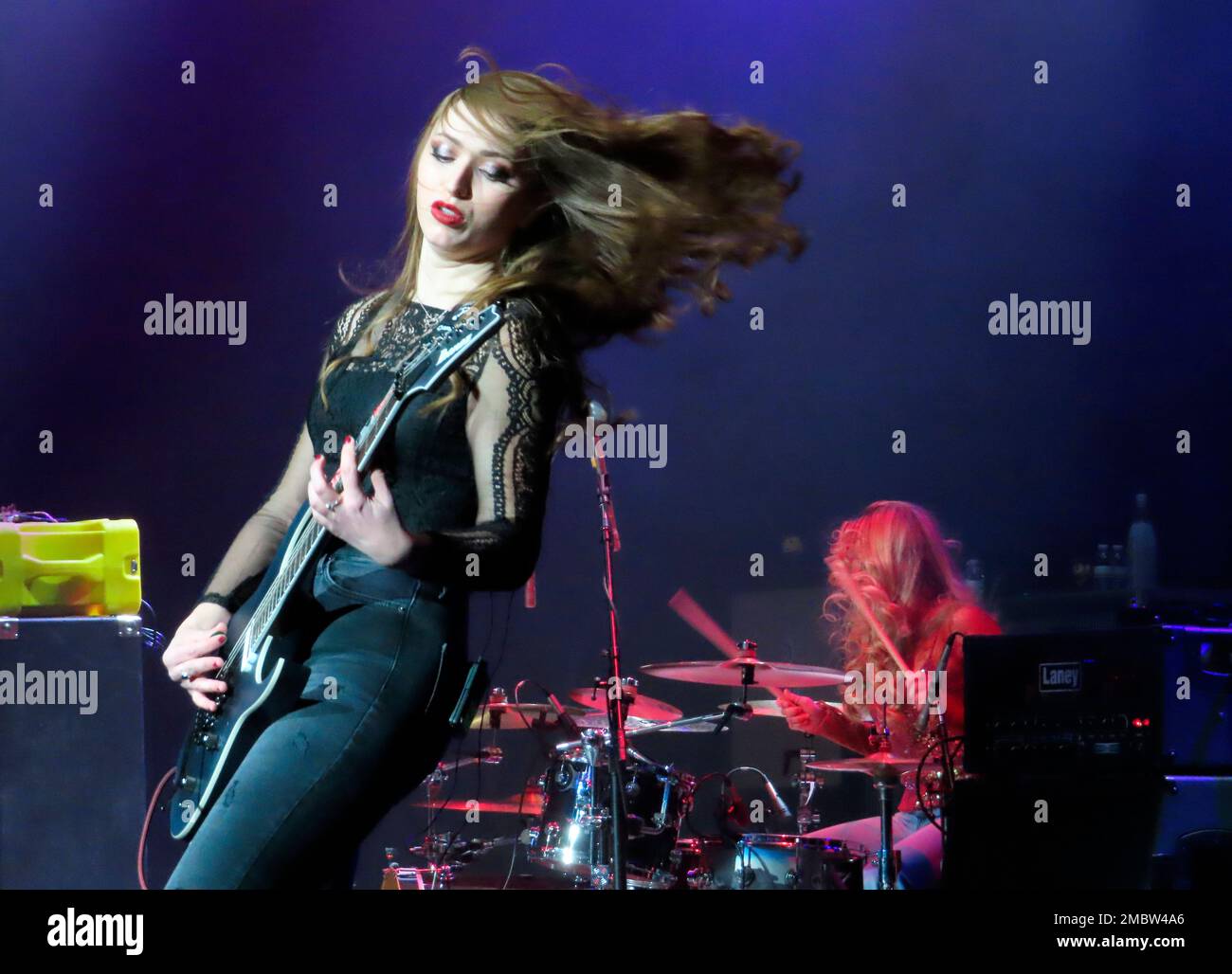 Lead guitarist Bella Perron, left, and drummer Brooke Colucci, of the ...