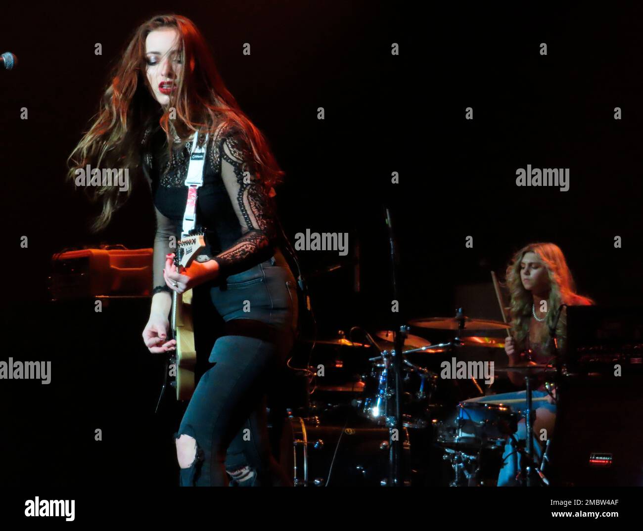 Lead guitarist Bella Perron, left, and drummer Brooke Colucci, of the ...