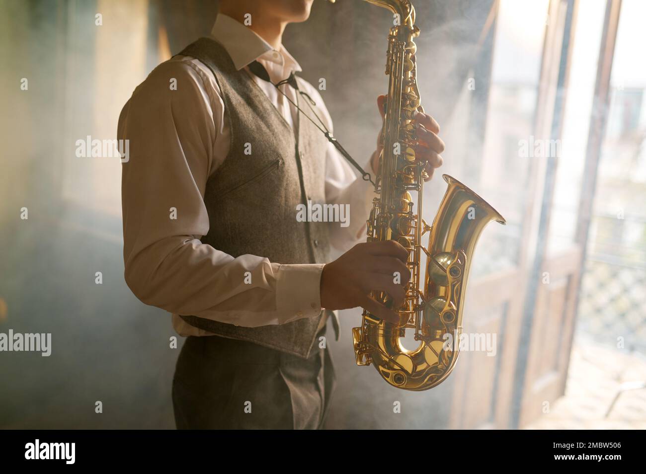 Saxophone player male hi-res stock photography and images - Alamy