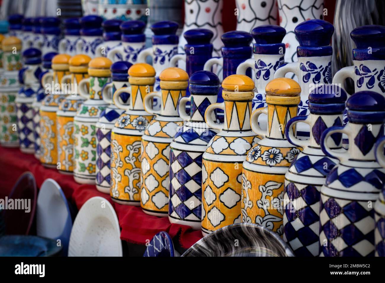 A closeup shot of Asian handmade ceramic, potteries, jars, vessels ...