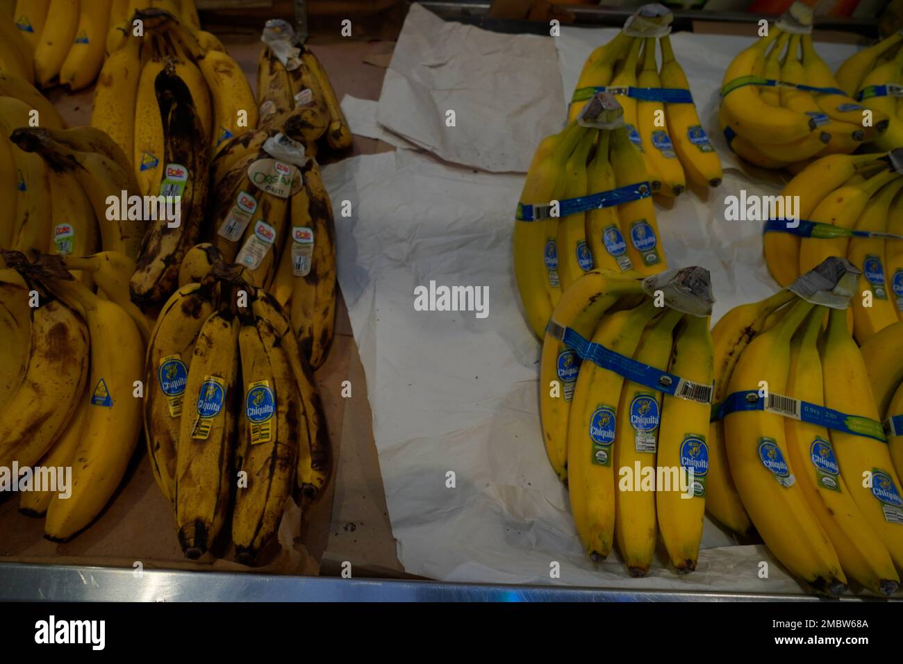Organic Dole bananas left, and Chiquita bananas are sold at the Grand ...