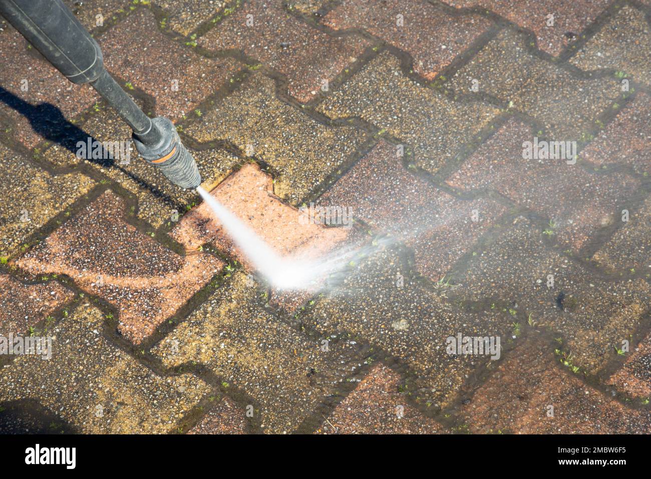 high pressure washing of floor slabs Stock Photo - Alamy