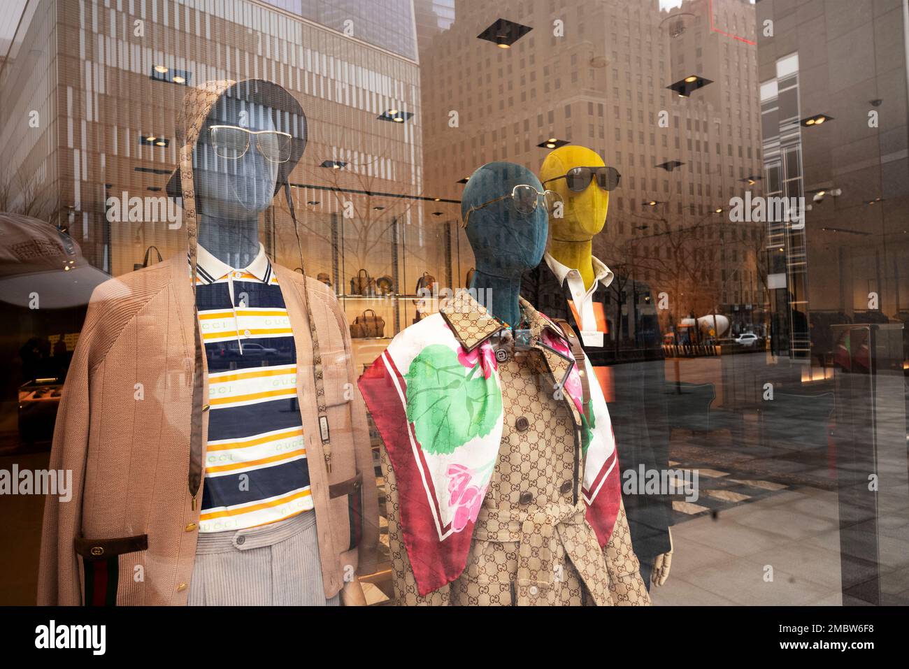 Fashions are displayed in a Gucci store window, Thursday, March 25 ...