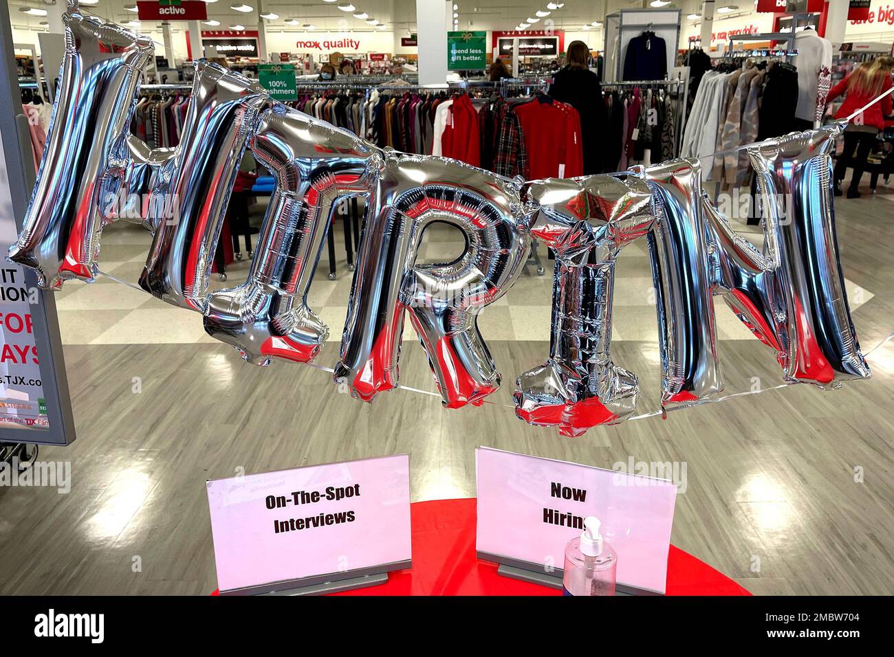 Holiday hiring signs are displayed at a retail store in Mount Prospects ...