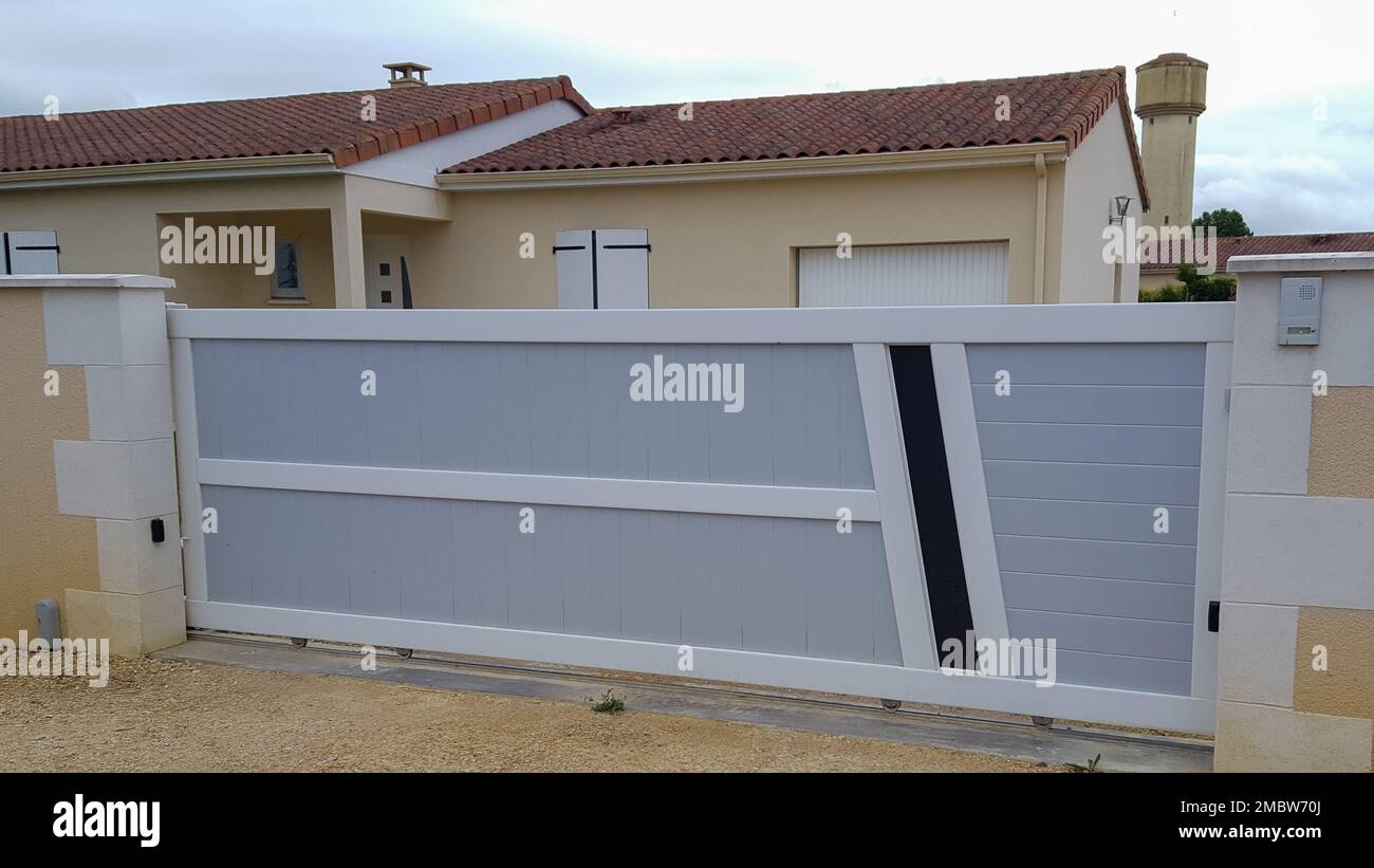 suburb home white grey modern pvc plastic house gate and slats Stock ...