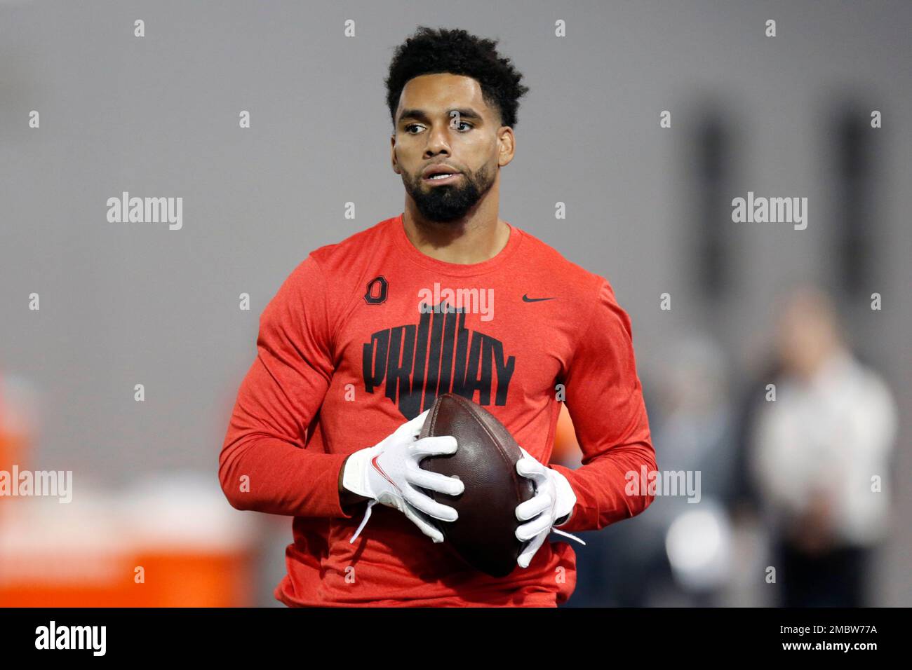 Wide receiver Chris Olave runs a football drill during Ohio State Pro ...