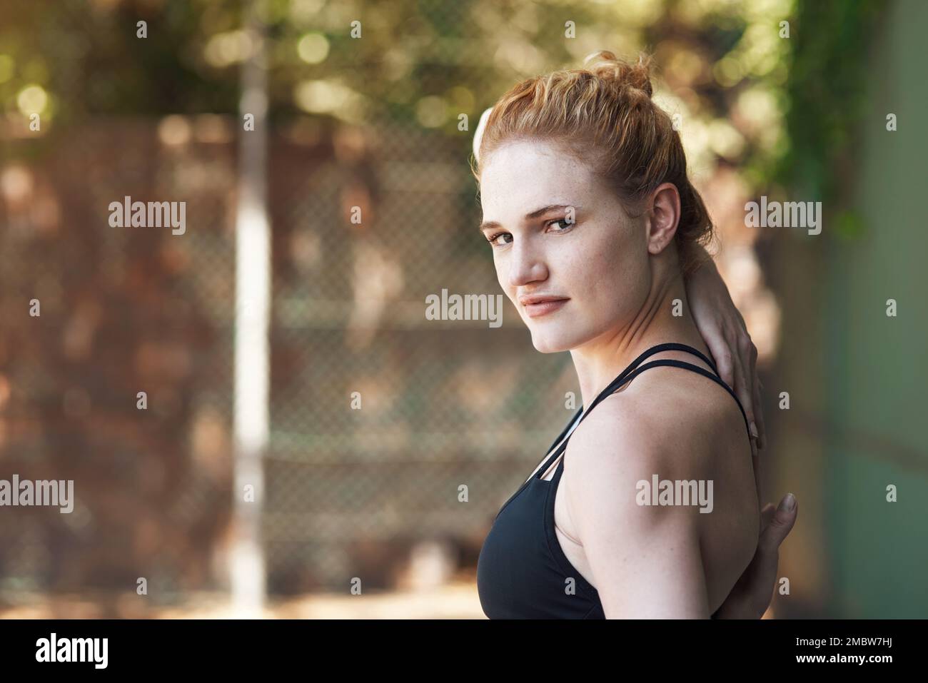 Stretch, win, repeat. Cropped portrait of an attractive young female ...