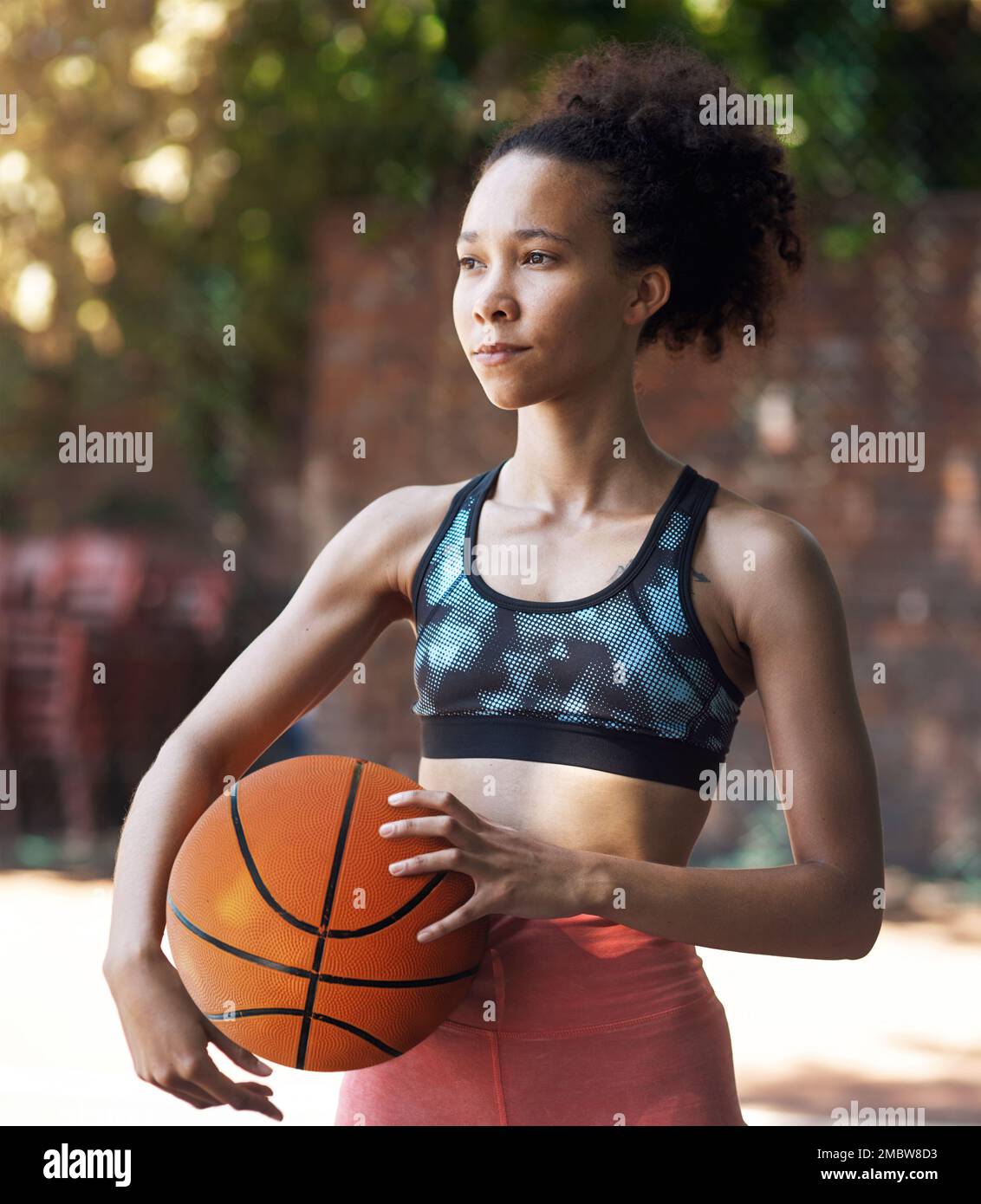 On the lookout for new challengers. an attractive young female athlete ...
