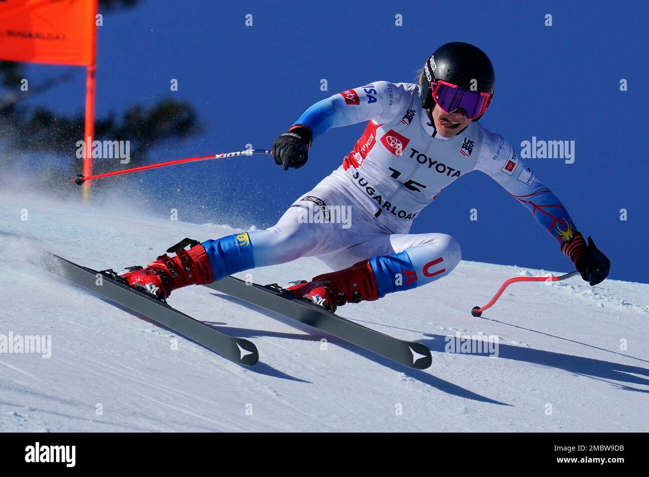 Ava Sunshine Jemison speeds down the course during a downhill ski race ...