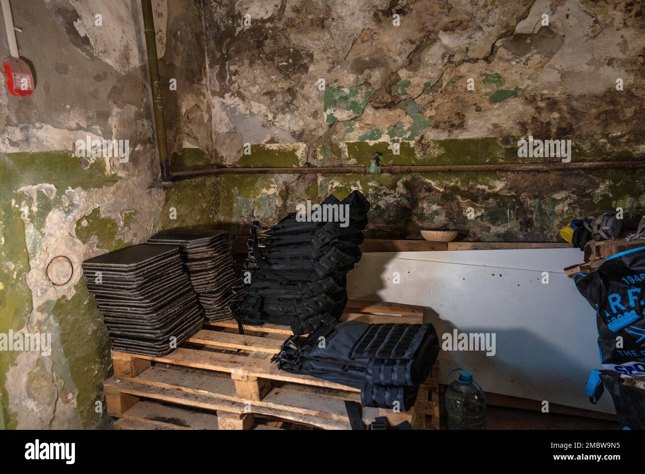 New bulletproof vests are displayed in an artists co-living studio ...