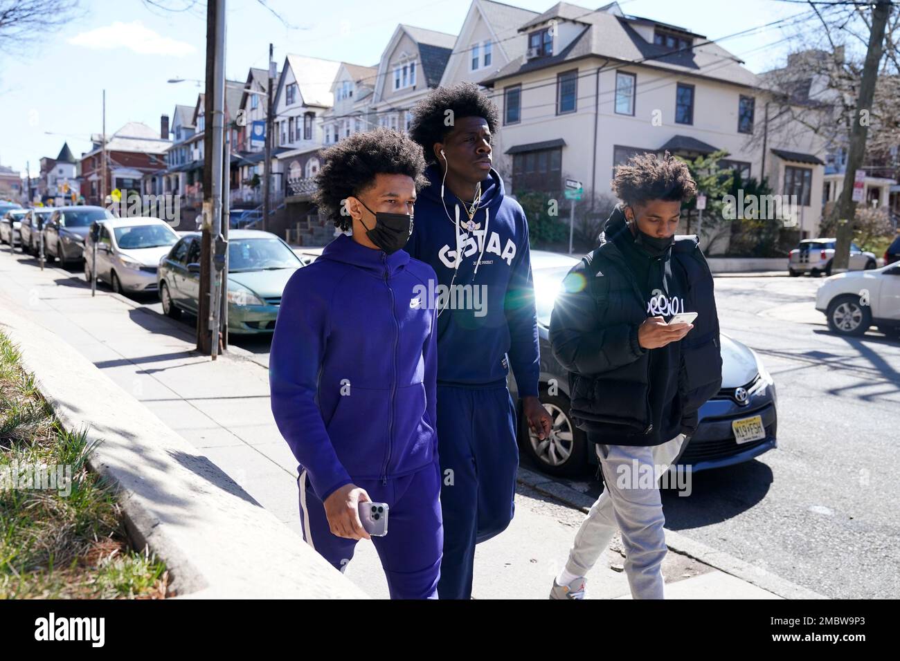 Saint Peter's University basketball players Matthew Lee, left, Clarence ...
