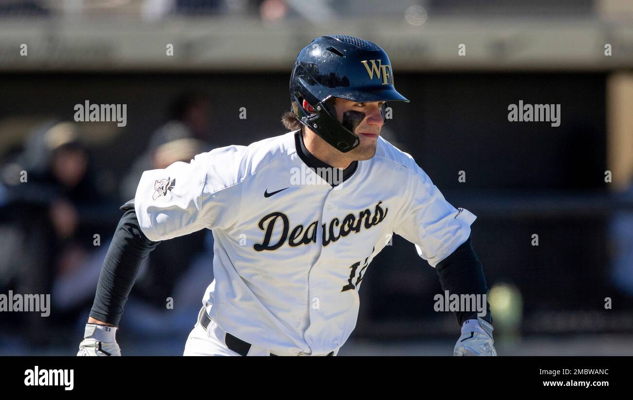 Wake Forest's Adam Cecere (12) runs to first base during an NCAA ...