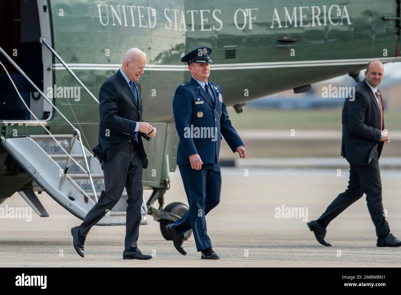 President Joe Biden escorted by Col. Matthew Jones, Commander of the ...