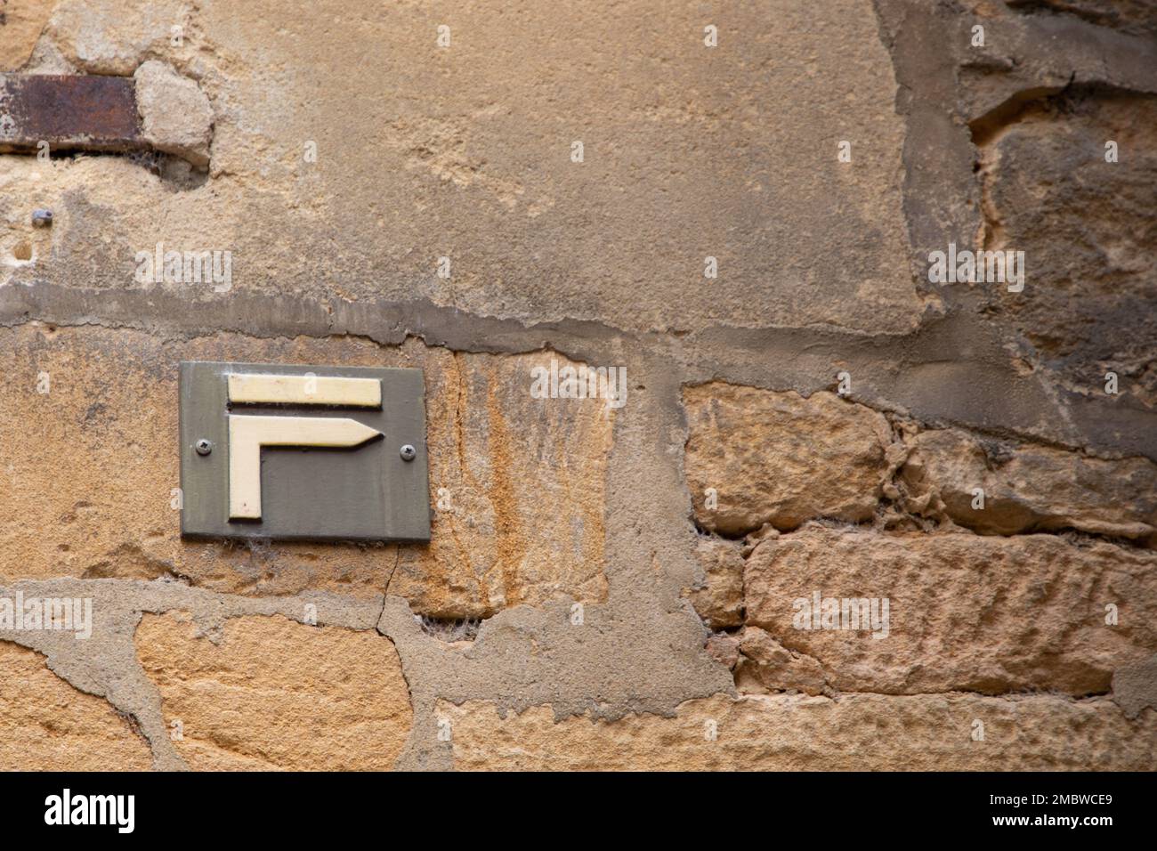 colored yellow marked walking path sign and hiking trails pathway in ...