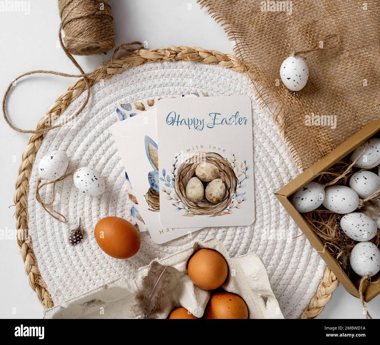 Easter mockup with traditional eggs and sack decor Stock Photo - Alamy