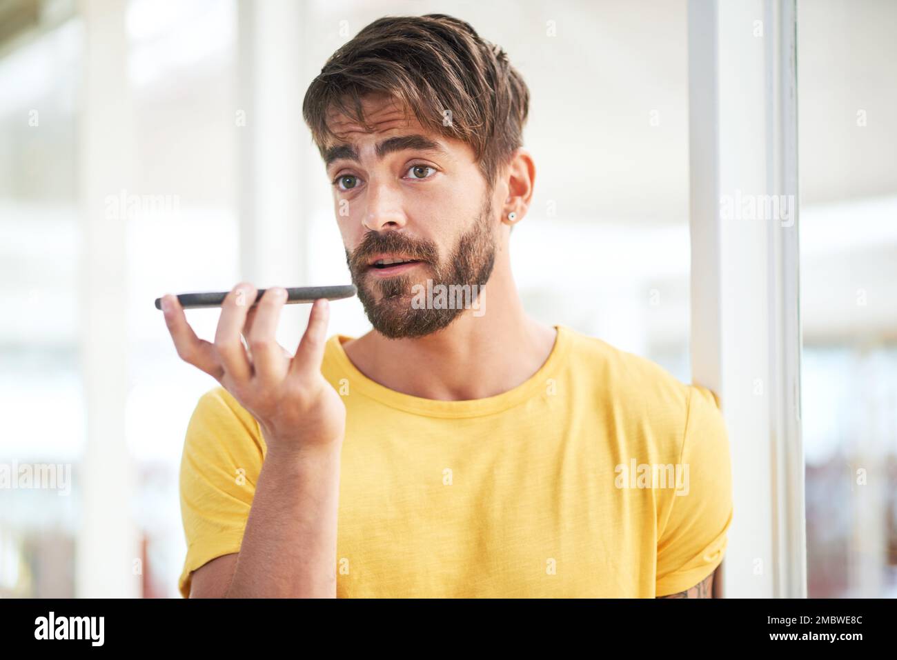 Im on board if you are. a young businessman using a smartphone in a ...