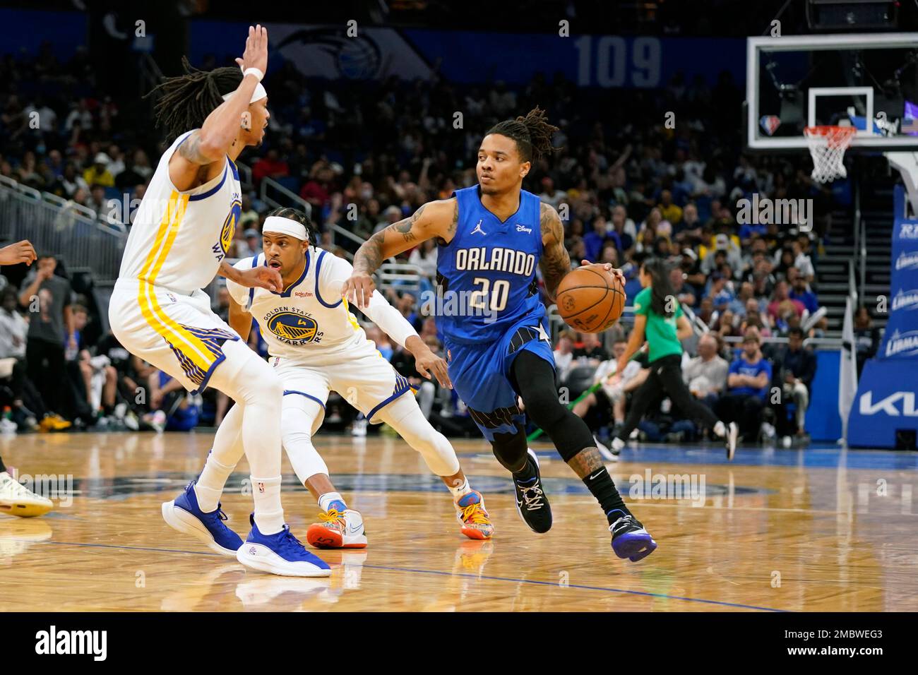 Orlando Magic guard Markelle Fultz (20) drives around Golden State ...