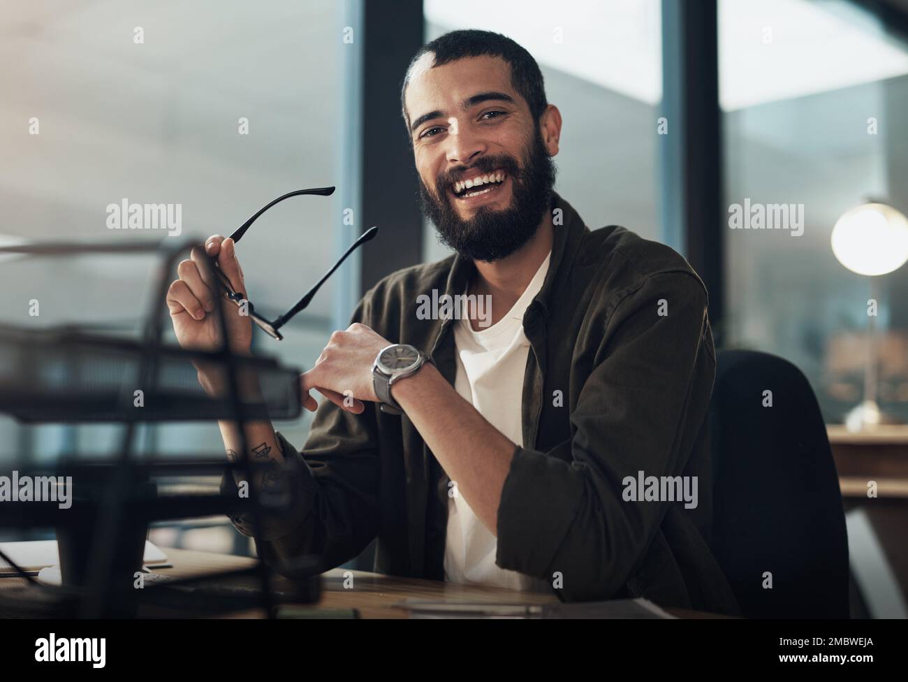 Productivity is fuelled by positivity. Portrait of a confident young ...