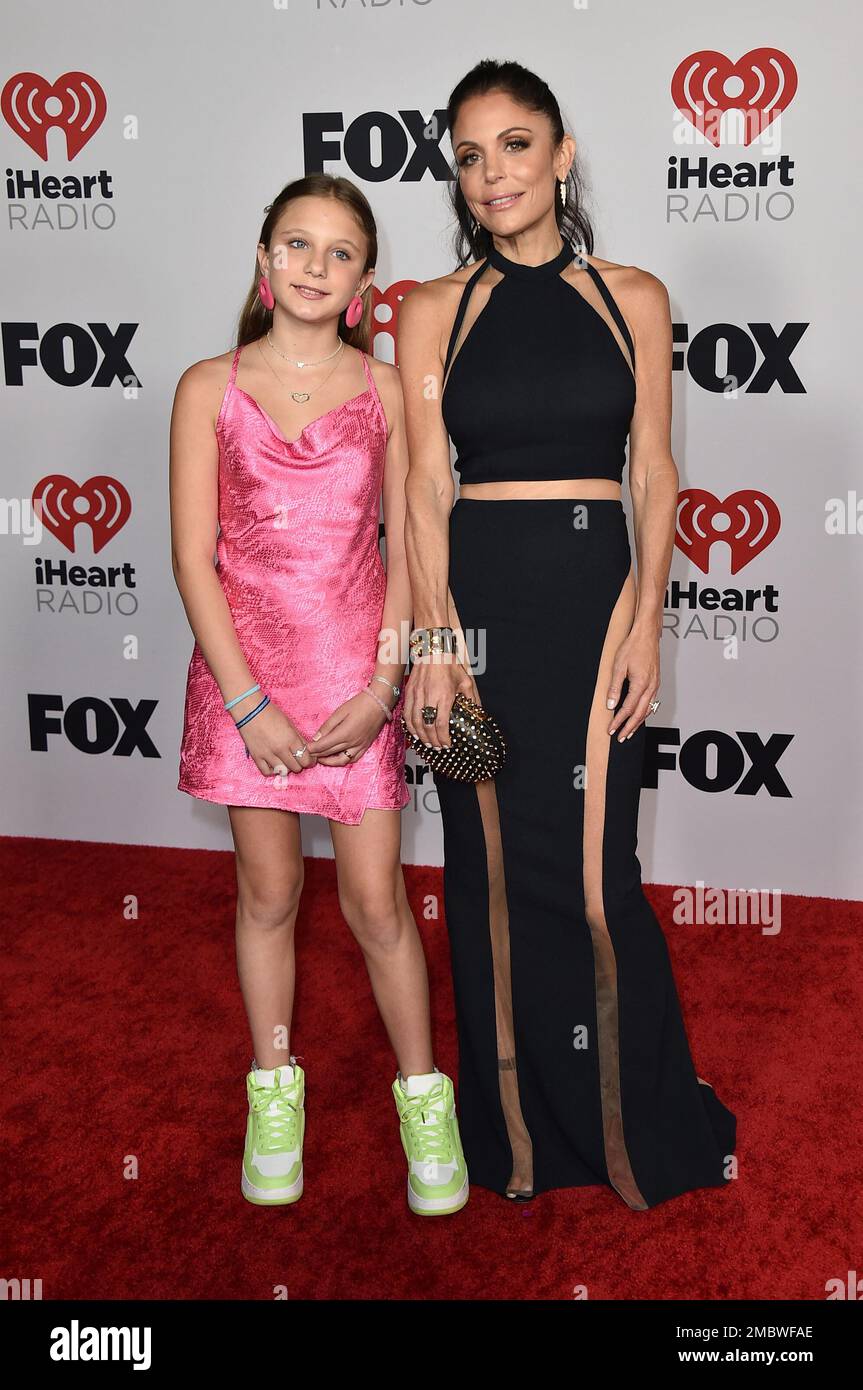 Bethenny Frankel, right, and Bryn Hoppy arrive at the iHeartRadio Music ...