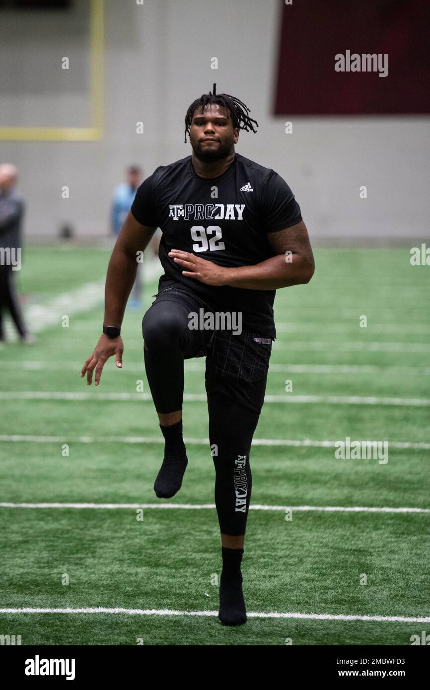 Texas A&M's Jayden Peevy warms up during the school's pro day for NFL ...