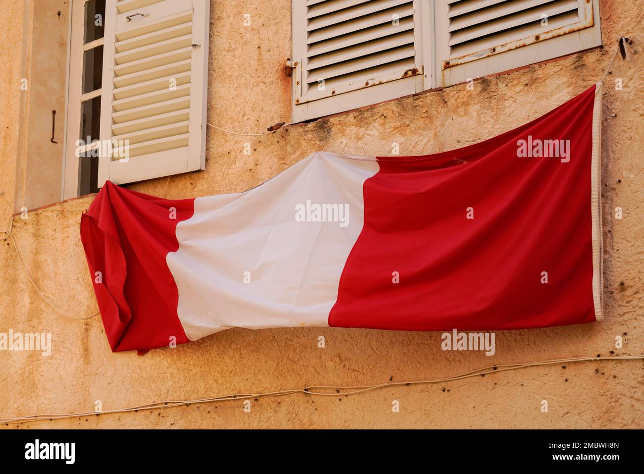 Red White Red Austrian flag in horizontal view front facade building ...