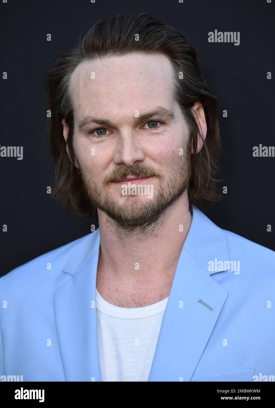 Adam Nee arrives at the Los Angeles premiere of "The Lost City," Monday ...