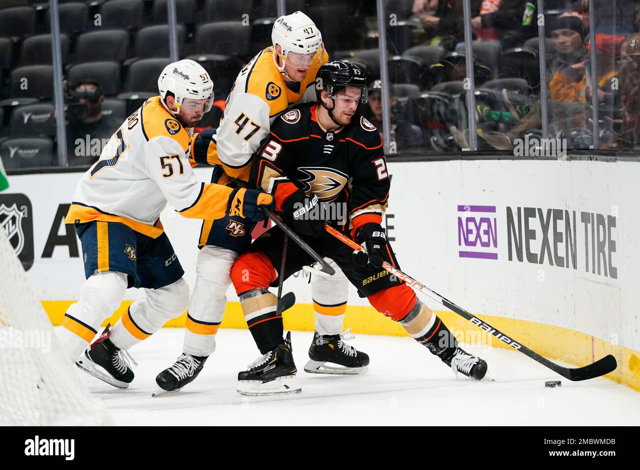 Anaheim Ducks' Sam Steel, right, is defended by Nashville Predators ...