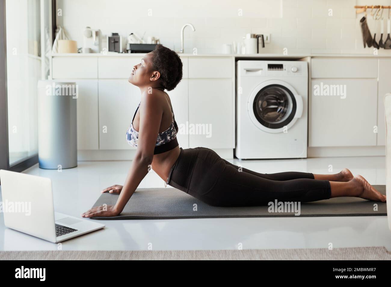 Good health is the foundation of it all. a young woman using a laptop ...